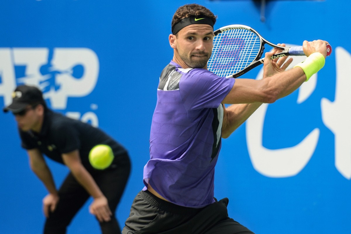 Com bolo e festa preparada por 300ª vitória, Dimitrov perde match ...