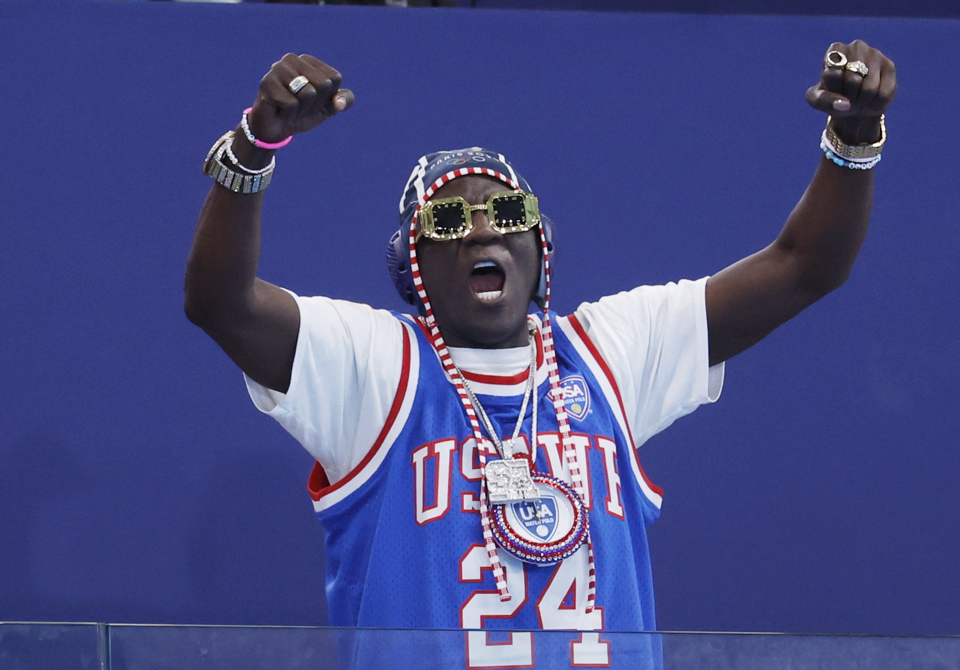 Rapper Flavor Flav paga aluguel para ajudar atleta americana que vai ...